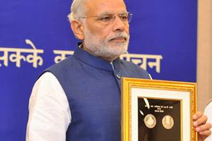 PM Narendra Modi releases Rs 10, Rs 125 commemorative coins honouring ...
