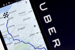 Eric Holder weighs in for Uber against fingerprint checks - Industry ...