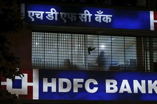 HDFC Bank shares soar to all-time high, go past Reliance Industries to ...