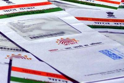 UIDAI warns against agencies printing plastic Aadhaar cards - Economy ...