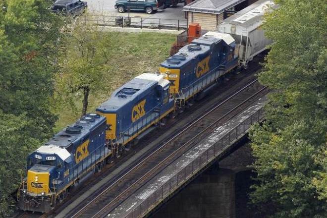 Railroad CSX stock jumps on earnings, share buyback; CEO Hunter ...