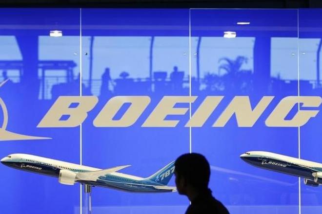 Boeing profit rises, revenue slips; full-year profit target lifted ...