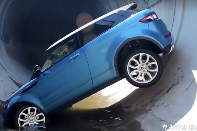 Watch this Range Rover break physics and the internet, all in a storm ...
