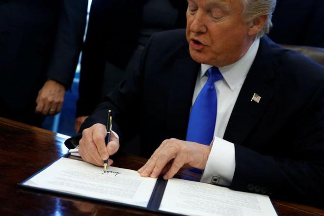 Donald Trump signs $1 trillion spending bill, keeps government open ...