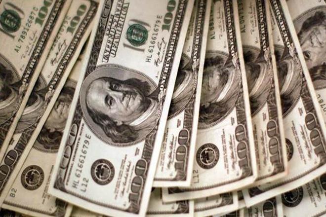 Dollar trades lower before Fed speeches - Market News | The Financial ...