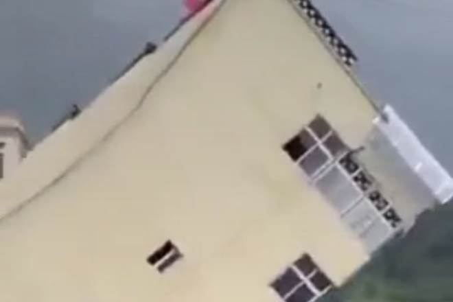 Shocking video: Watch as 5 storey building falls into river after heavy ...