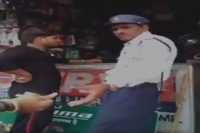 Cop caught on camera taking bribe in Gwalior; watch video - India News ...