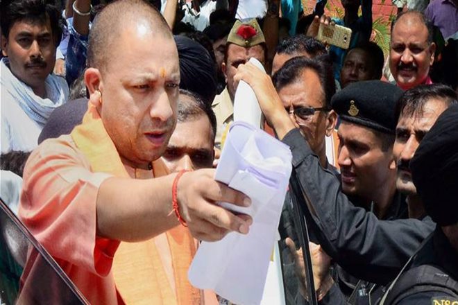 UP CM Yogi Adityanath visits flood-hit Lakhimpur Kheri, orders relief measures | The Financial ...