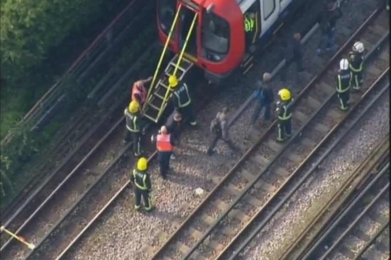 London Underground blast: After explosion, flames spew from canister ...