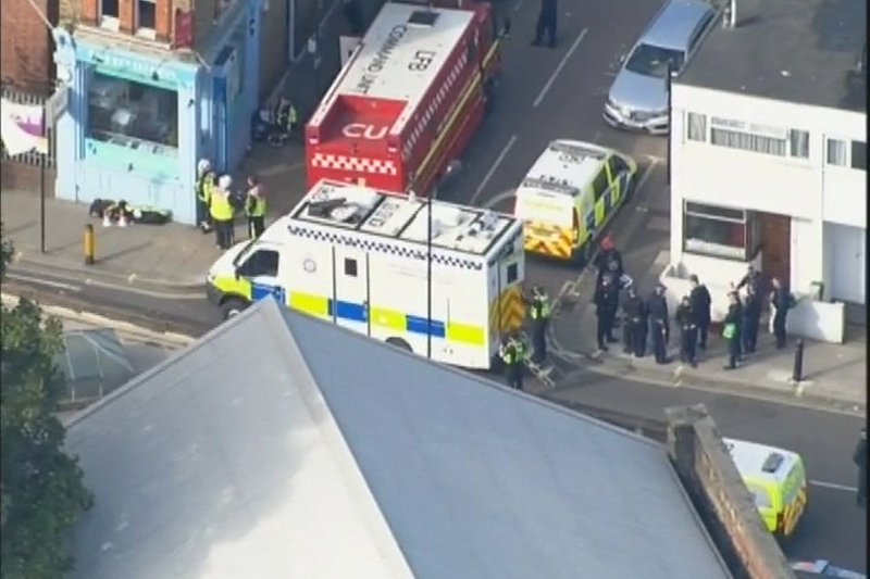 London Underground blast: After explosion, flames spew from canister ...