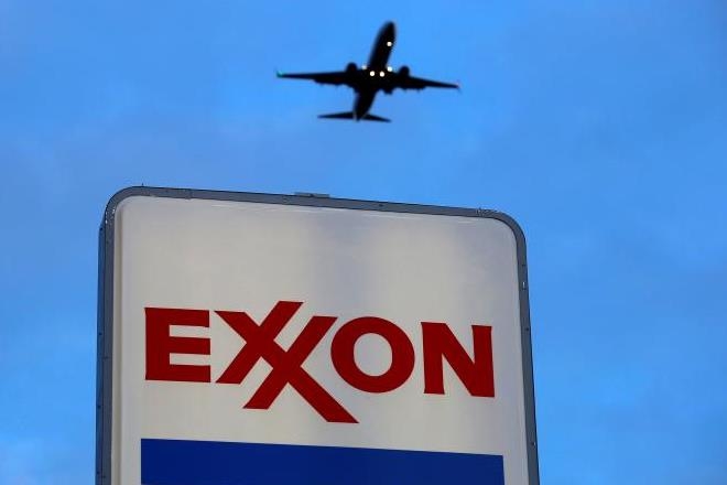 Exxon Mobil CEO Darren Woods makes first big changes to refining ...