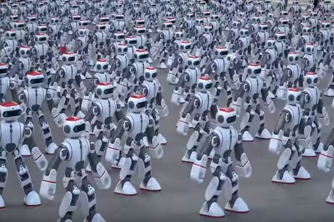 Record of a different kind: Over 1,300 robots dance together to break ...