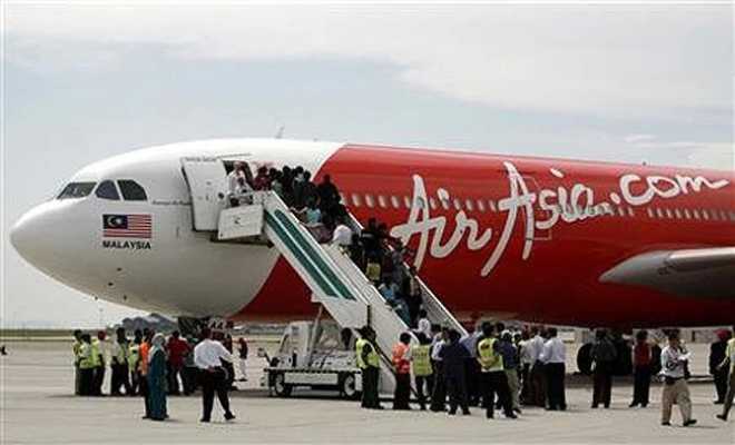 AirAsia flight delay: Airline staff accused of ‘unprofessional, rude ...