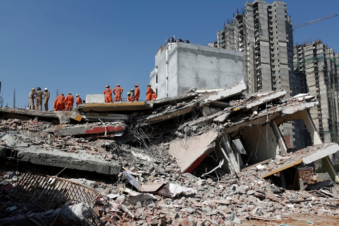 Greater Noida building collapse LIVE updates: 18 booked, 3 including ...
