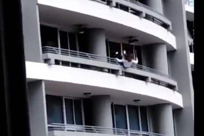 Woman Falling Off Building