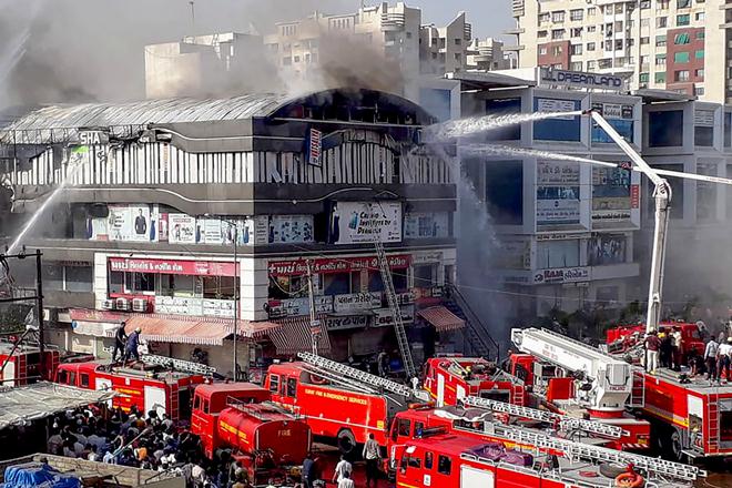 Surat fire tragedy: Coaching centre owner arrested, toll mounts to 20 - India News | The ...