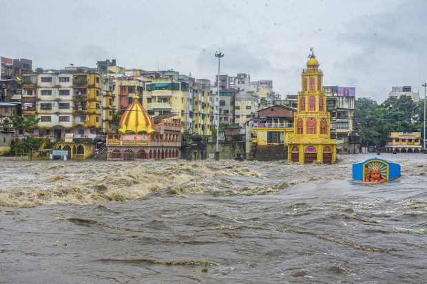 In Pictures | Temples submerge in Maharashtra’s Nashik as Godavari river overflows due to heavy ...