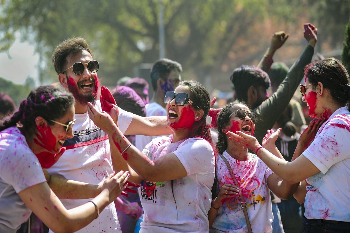 Holi 2023 in pictures: Indian streets don a colourful avatar as people gather to celebrate ...