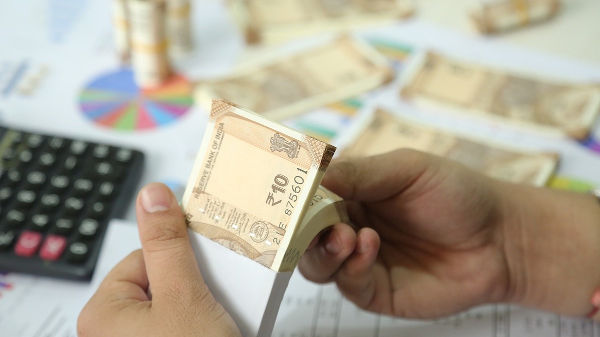 Rupee falls, but holds important technical levels; premiums rise ...