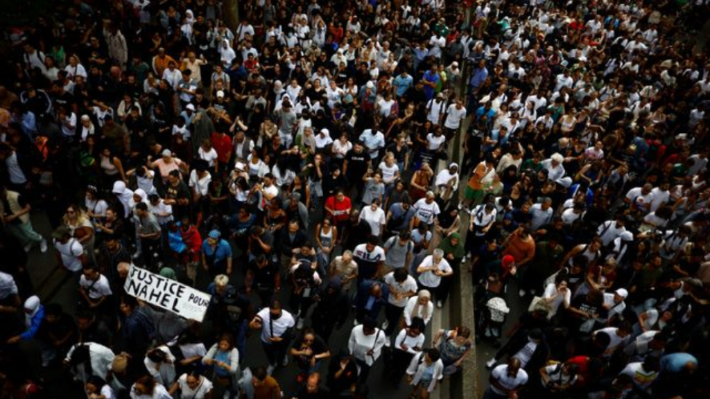 Riots spread in France, thousands march in memory of shot teenager ...