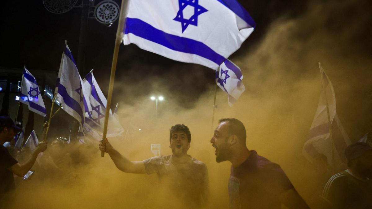 Mass protests sweep Israel as demonstrators rally against government's ...