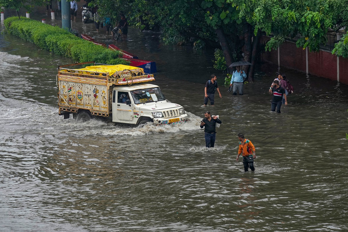Heavy monsoon rains in North India: Respite from heat or commuters ...