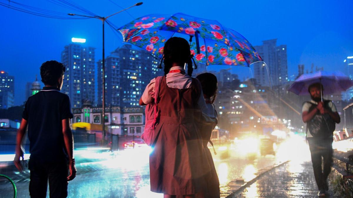 Heavy rains paralyse Mumbai: Schools, colleges shut as IMD issues red alert; 45-year-old woman ...