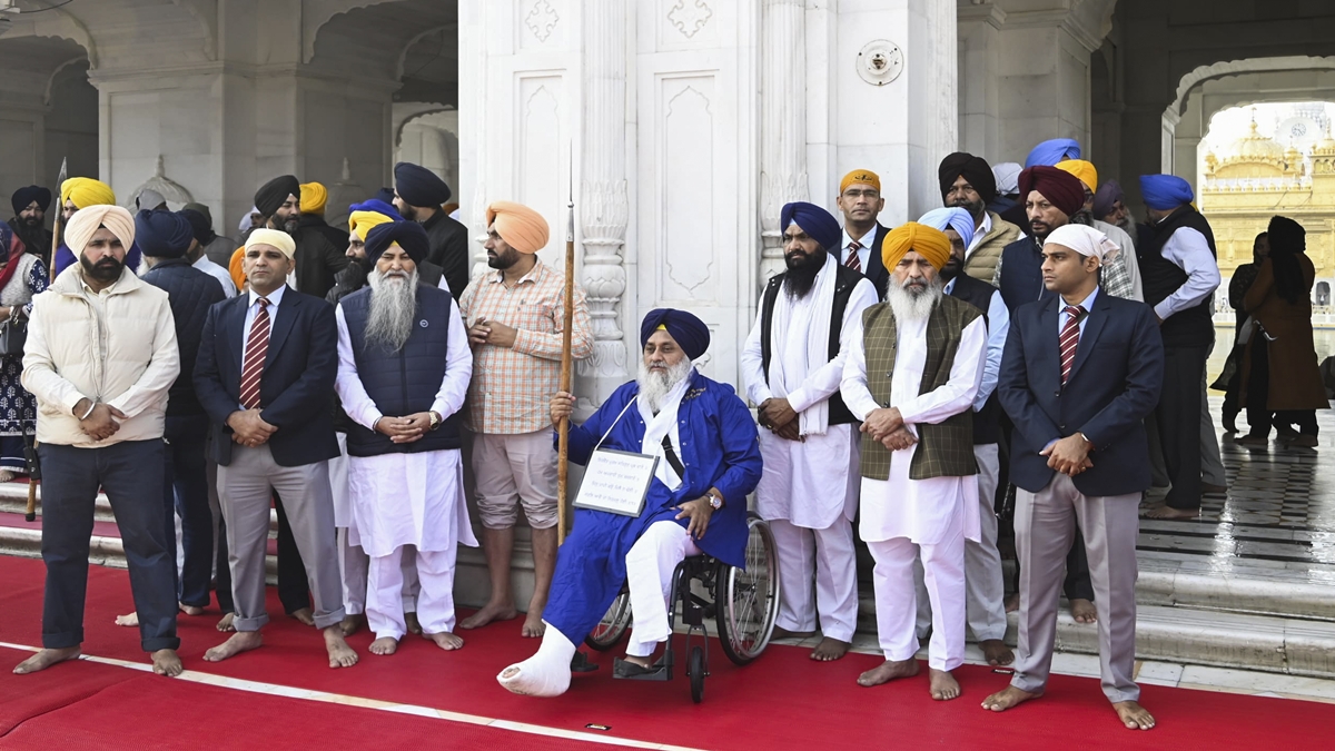 A day after Akal Takht indictment, Sukhbir Singh Badal stands guard outside Golden Temple ...