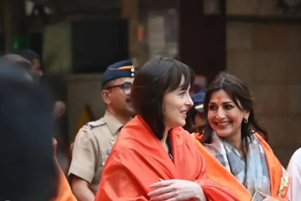 In Pictures | Chris Martin, Dakota Johnson visit temples during Coldplay's India tour ...