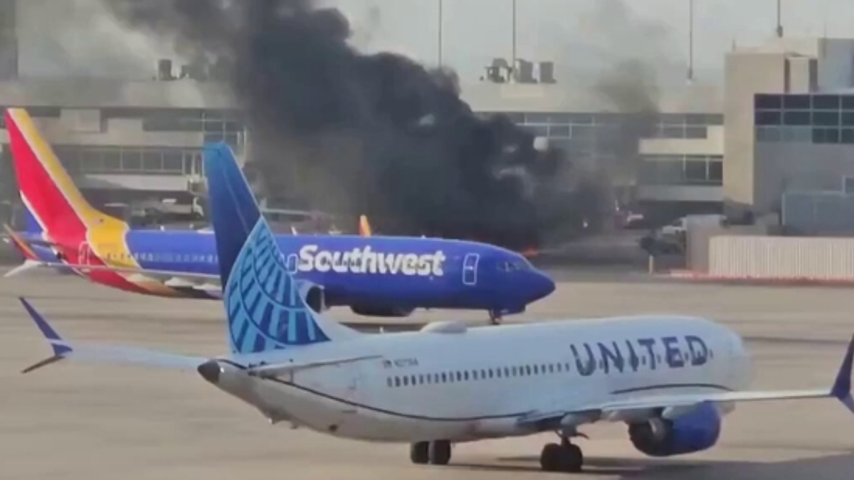 American Airlines flight catches fire at Denver Airport, passengers evacuated via emergency ...