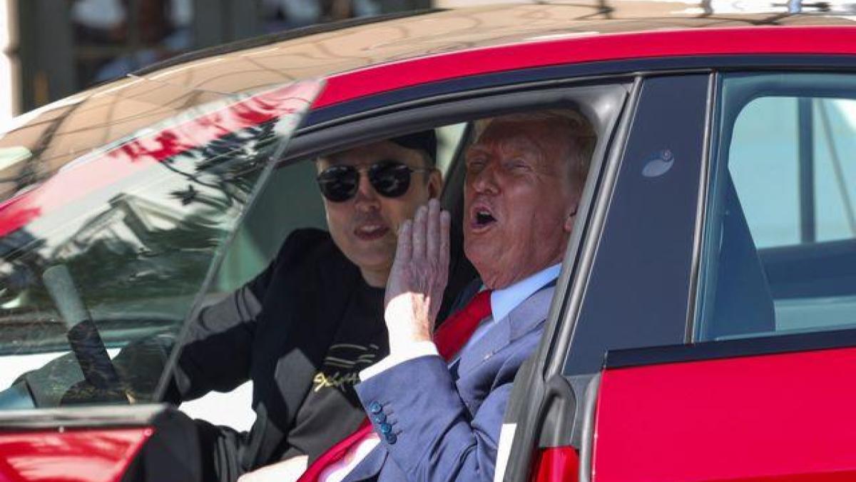 Trump buys a Tesla car as White House calls backlash 'domestic ...
